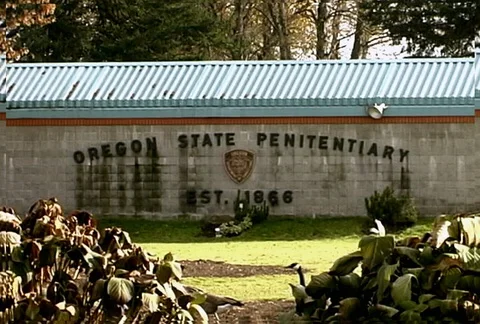 Entrance sign on stained penitentiary wa... | Stock Video | Pond5