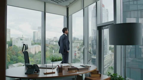 Entrepreneur looking office window. Smar... | Stock Video | Pond5