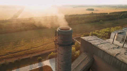 Epic aerial of high smoke stack with red... | Stock Video | Pond5