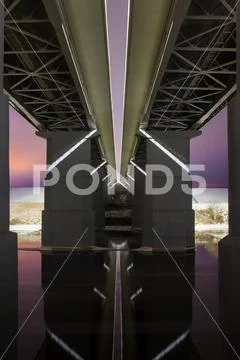 Photograph: Epic view from under the bridge and night winter landscape ...