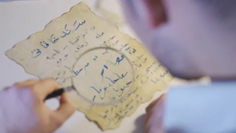 Epigraphist examining a letter written f... | Stock Video | Pond5