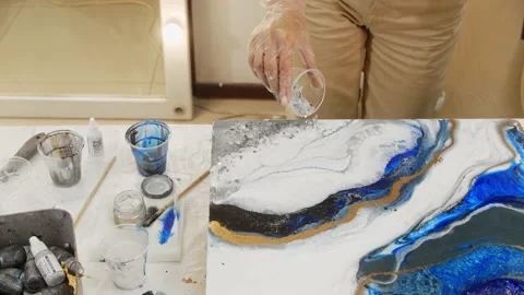 Epoxy design - adding texture with clear... | Stock Video | Pond5