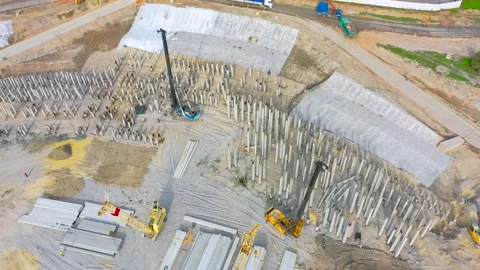 Equipment for installing piles in ground... | Stock Video | Pond5