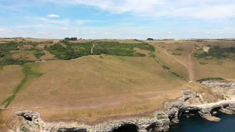 Erosion and Caves at The Dancing Ledge o... | Stock Video | Pond5
