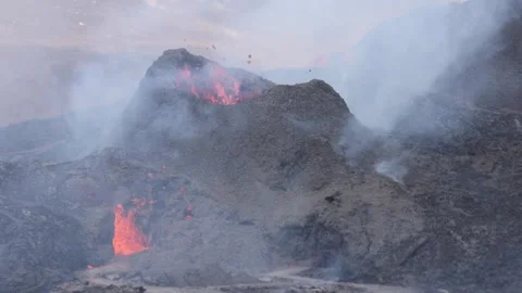 erupting volcano, volcanic lava melting ... | Stock Video | Pond5