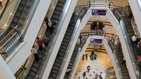Escalator 4k shopping mall crowd people ... | Stock Video | Pond5