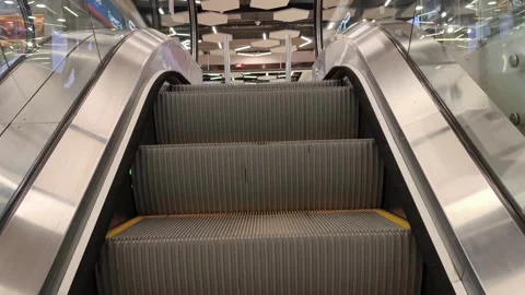 Escalator in the mall. Escalator ascent ... | Stock Video | Pond5
