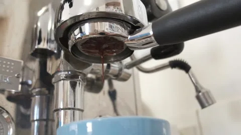 Espresso extraction from a coffee machin... | Stock Video | Pond5