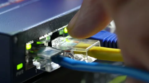 Plug In Ethernet Cable Stock Footage ~ Royalty Free Stock Videos | Pond5
