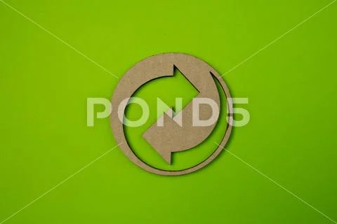 European recycling symbol for cardboard and paper packaging on green ...