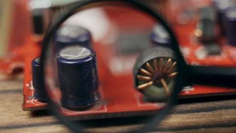 Examining the details of an electronic b... | Stock Video | Pond5