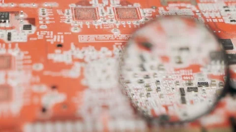 Examining the details of an electronic b... | Stock Video | Pond5