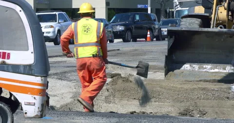 Excavator and road scraping machine remo... | Stock Video | Pond5