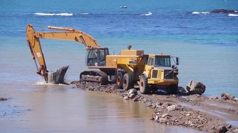 excavator and truck moving sand working ... | Stock Video | Pond5