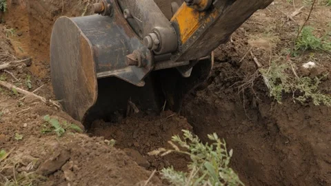 excavator digger digging earth, big scoo... | Stock Video | Pond5