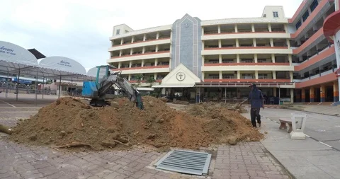excavator digger tree and root on a buil... | Stock Video | Pond5