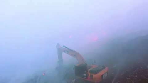 Excavator fighting a wild fire, surround... | Stock Video | Pond5