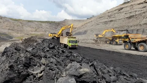 excavator loading coal to truck part 4 | Stock Video | Pond5