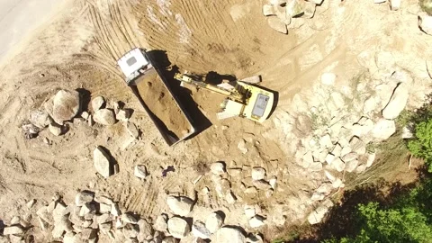 Excavator Removing Sand Into Dump Truck ... | Stock Video | Pond5
