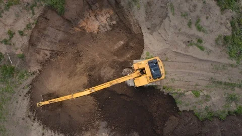 Excavator tractor digger working, aerial... | Stock Video | Pond5