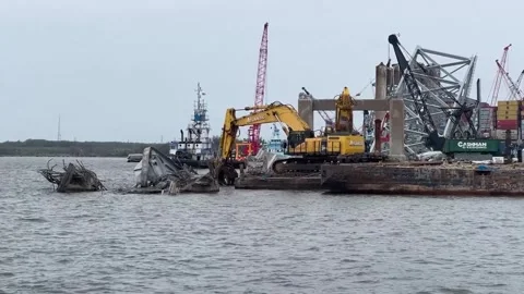 Excavators removing Francis Scott Key Br... | Stock Video | Pond5