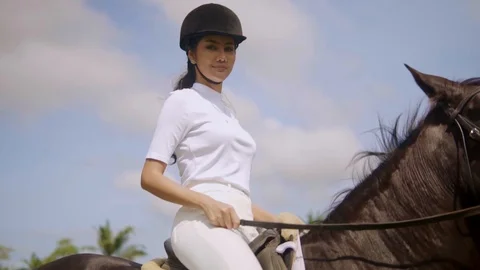 Excellent portrait shooting girl riding ... | Stock Video | Pond5