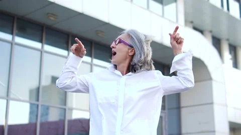 Excited full of energy woman having fun ... | Stock Video | Pond5