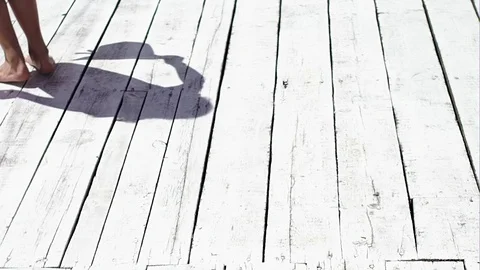 Excited girl child jumping shadow | Stock Video | Pond5