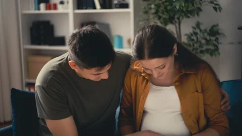 Excited young couple expecting baby, pre... | Stock Video | Pond5