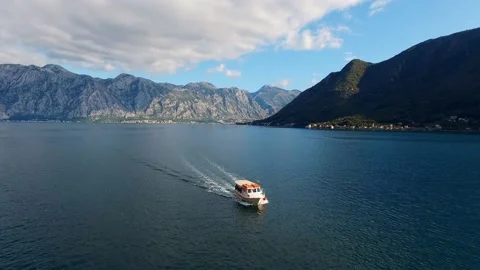 Excursion boat floats along the bay agai... | Stock Video | Pond5