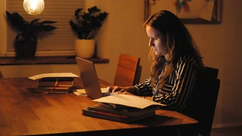 Exhausted woman study at night in the ki... | Stock Video | Pond5