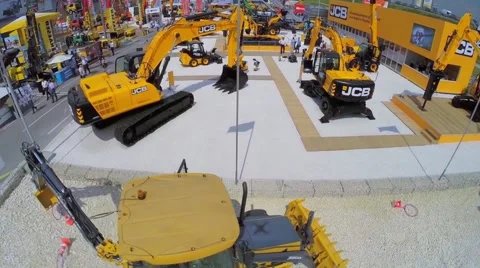 Exhibits of John Deere and JCB machines ... | Stock Video | Pond5