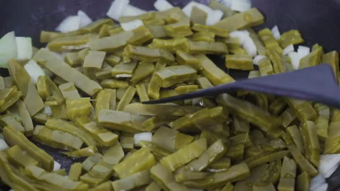 Exotic cactus food being fried with onio... | Stock Video | Pond5