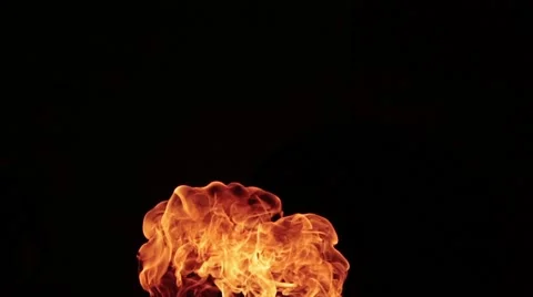 Exploding flame and fire isolated on bla... | Stock Video | Pond5
