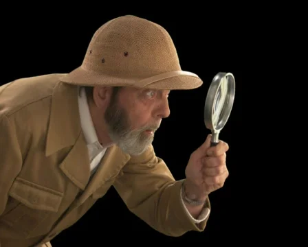Explorer with Magnifying Glass Profile | Stock Video | Pond5