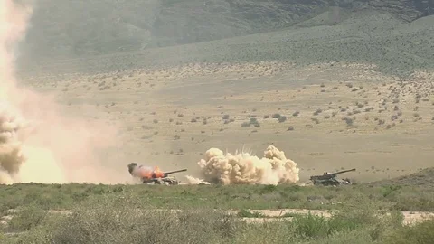Explosion as battle tanks are hit by A-1... | Stock Video | Pond5