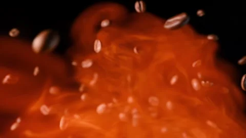 Explosion of fresh roasted beans | Stock Video | Pond5