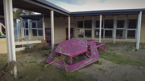 Exterior of school building flooded with... | Stock Video | Pond5