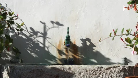 Exterior Water Spicket on House Wall and... | Stock Video | Pond5