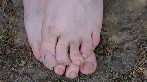 Extreme close up of bare feet toes rubbi... | Stock Video | Pond5
