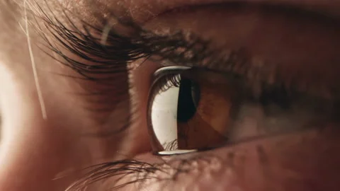 Extreme close-up of a blinking eye in sl... | Stock Video | Pond5