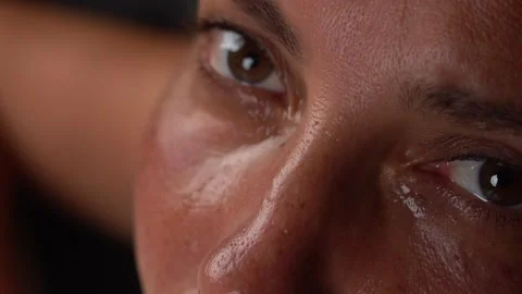 Extreme close-up eyes full of tears of a... | Stock Video | Pond5