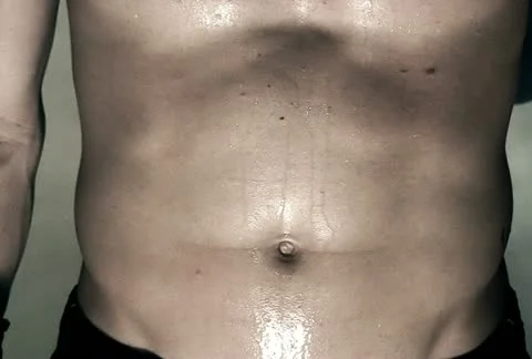 Extreme Close Up Male Stomach During Wor... | Stock Video | Pond5