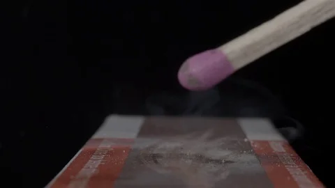Extreme close up of a match being lit. F... | Stock Video | Pond5