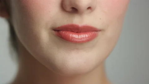 Extreme close on pretty model's mouth in... | Stock Video | Pond5