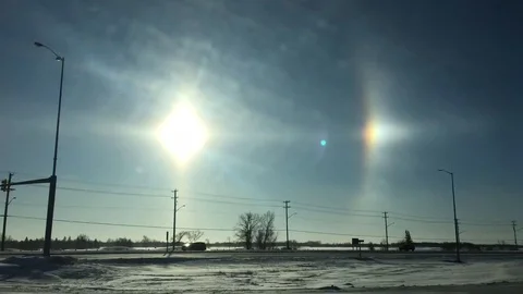 Extreme cold in Canada creates sun dog p... | Stock Video | Pond5