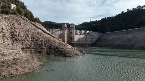 Extreme low water levels at dam reservoi... | Stock Video | Pond5