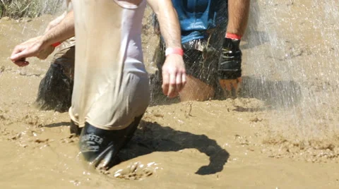 Extreme sport challenge jump in mud wate... | Stock Video | Pond5