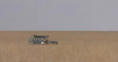 Extreme wide pan shot of a filming vehic... | Stock Video | Pond5