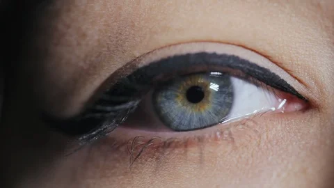 Eye iris contracting, pupil dilation, fr... | Stock Video | Pond5